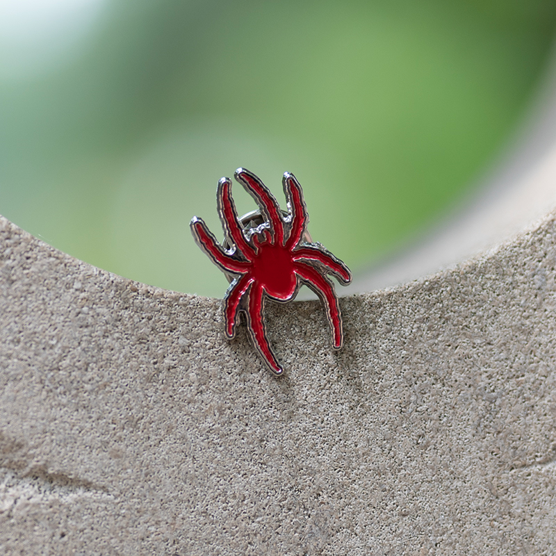 Spider lapel pin store